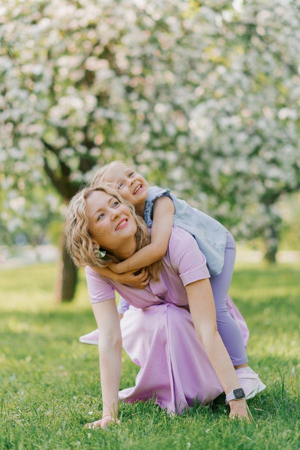 Mom and Daughter Have Fun in the Summer Outdoors in the Park Stock ...