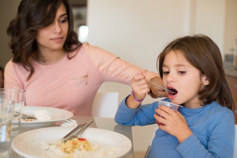Mom and Daughter Having Lunch Stock Image - Image of child, home: 62418987