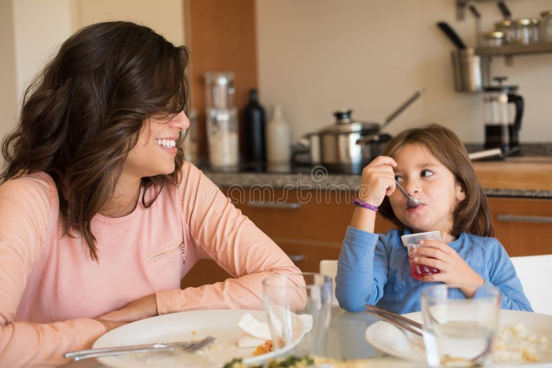 Mom and Daughter Having Lunch Stock Photo - Image of child, love: 62419132