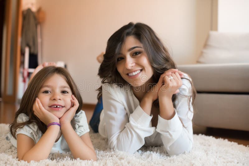 Mom and daughter at home stock image. Image of portrait - 73191299