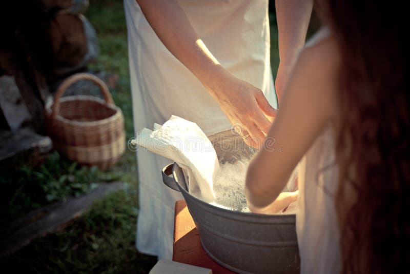 Mom and Daughter Wash Clothes Stock Photo - Image of housework ...