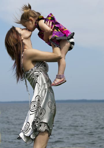 Mom and Daughter by the Water Stock Image - Image of caucasian, beauty ...