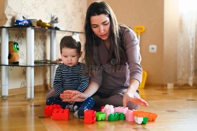 Mom Develops Her Child with Toys. the Future Builder Stock Photo ...
