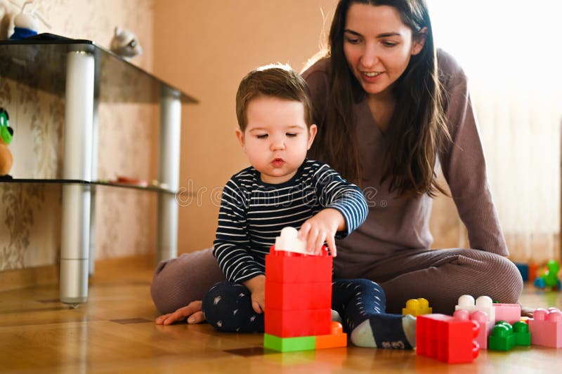 Mom Develops Her Child with Toys. the Future Builder Stock Photo ...