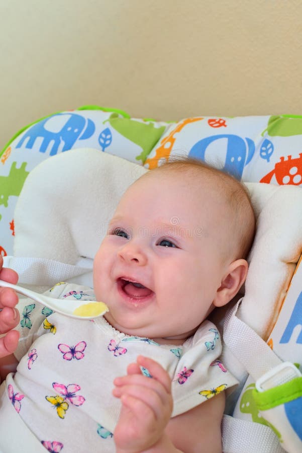 Mom Feeds the Child with Mashed Potatoes Stock Photo - Image of dinner ...