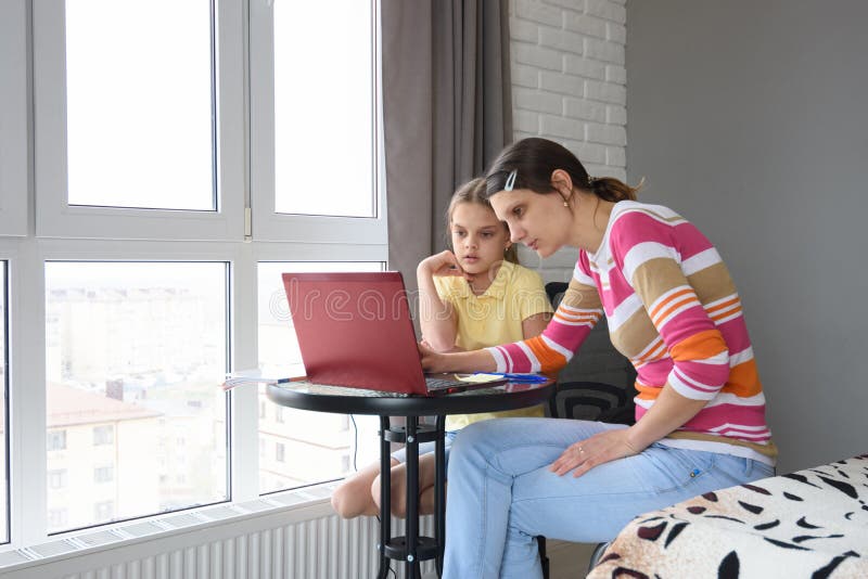 Mom Helps Her Child Learn Online Learning at Home Stock Photo - Image ...