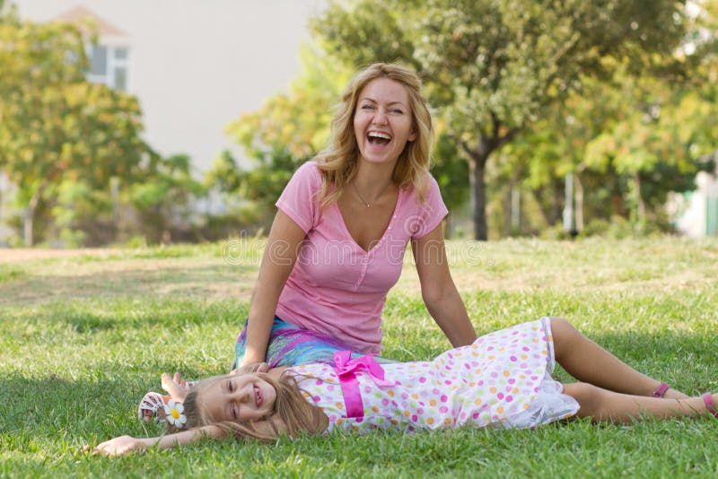 Mom and Her Daughter in the Park Stock Image - Image of enjoying ...