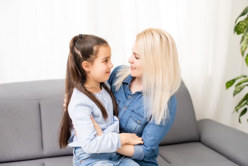 Mom With Her Pre Teen Daughter Hugging Positive Feelings Good