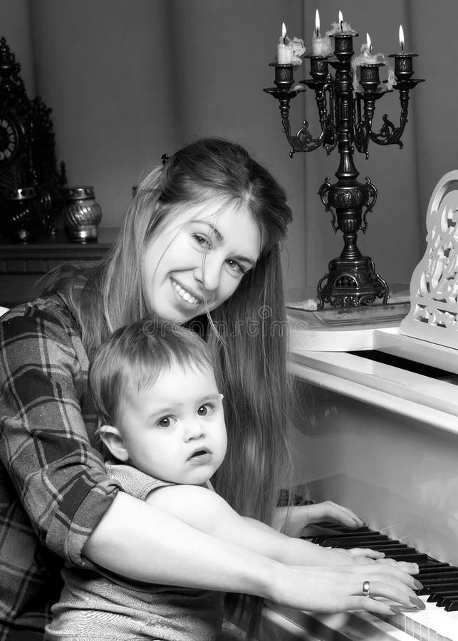 Mom And His Son For Piano Stock Image Image Of Little 128620351