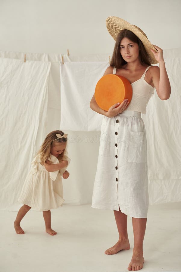 Mom holds a head of cheese stock image. Image of meal - 220179199