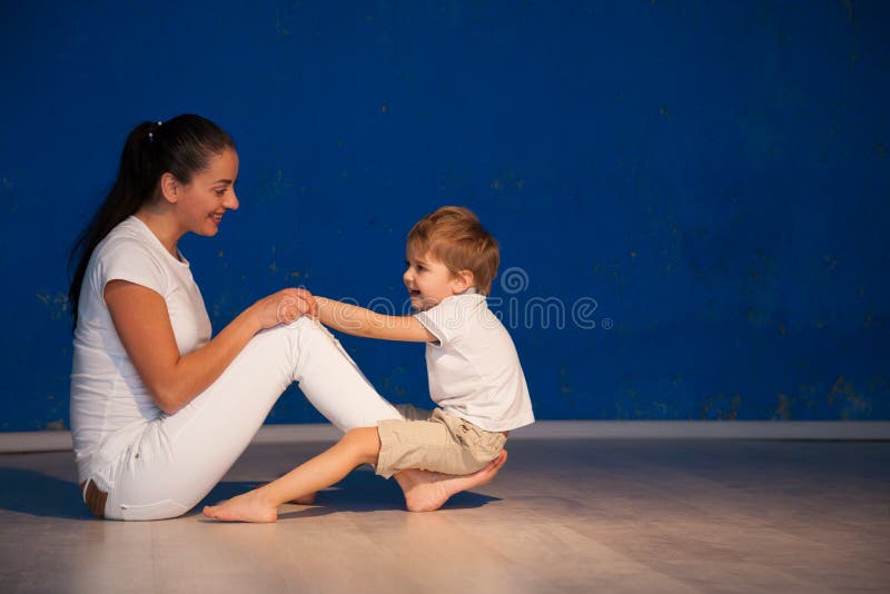 Mom Keeps Her Son at the Hands Stock Photo - Image of cute, junior ...