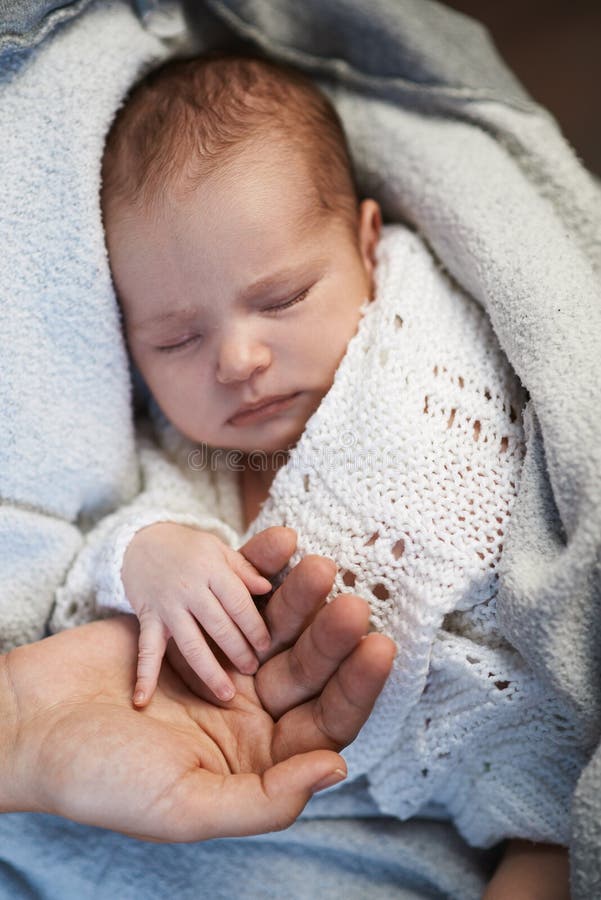 Mom Keeps Miniature Hand Newborn Baby in Hands Stock Photo - Image of ...