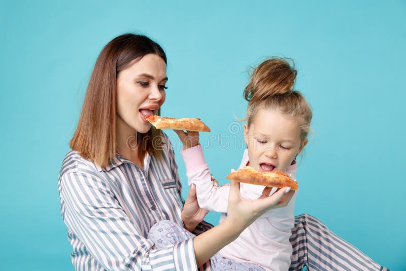 Mom and Kid Eating Pizza Together in the Morning. Stock Photo - Image ...