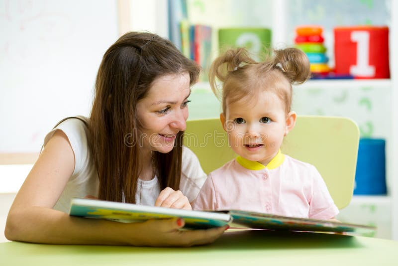 Mom and kid read a book stock photo. Image of child, hobby - 44786946