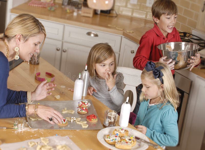 Mom and kids baking stock image. Image of brother, cake - 18159911