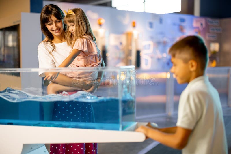 Mom with Kids Visit a Science Museum Stock Photo - Image of museum ...