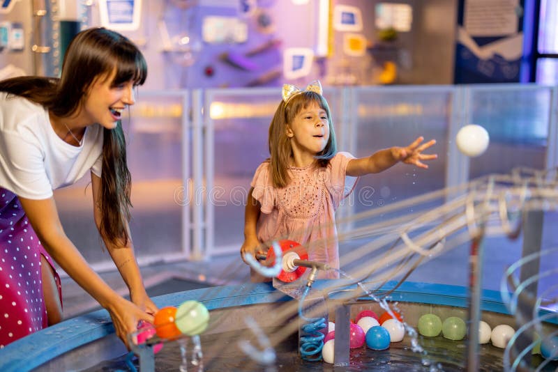 Mom with Kids Playing in a Science Museum Stock Photo - Image of child ...