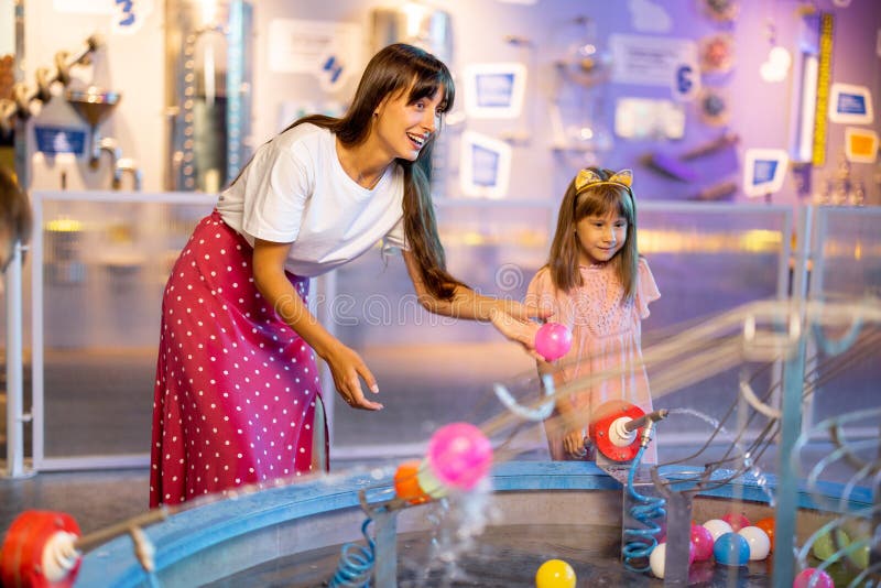 Mom with Kids Playing in a Science Museum Stock Image - Image of ...