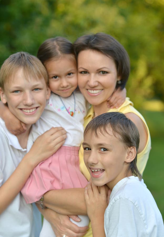 Mom with kids stock image. Image of emotions, nature - 36694815