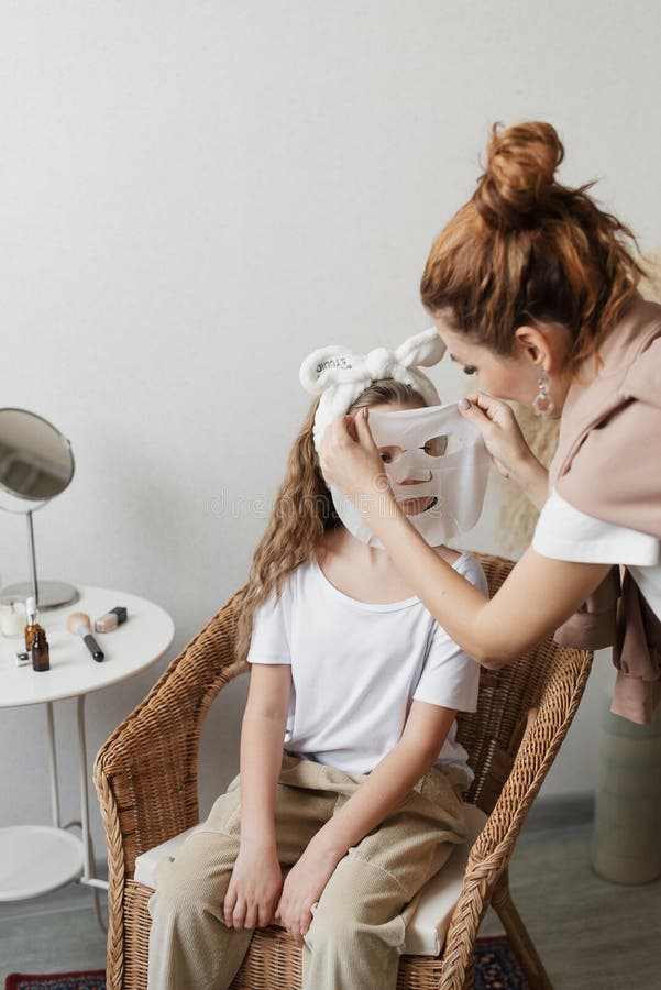 Mom Makes Her Daughter a Cloth Mask Stock Photo - Image of childhood ...