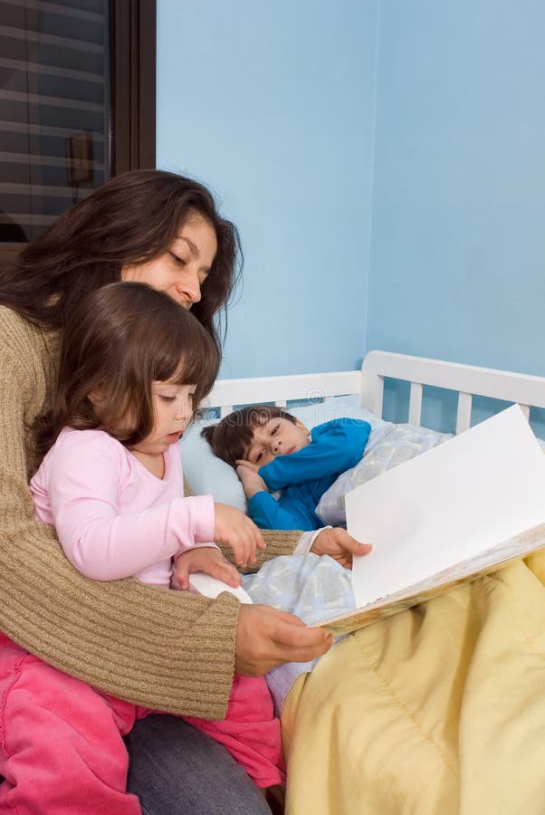 Mom Reading Bedtime Stories Stock Photo - Image of parents, love: 5252030
