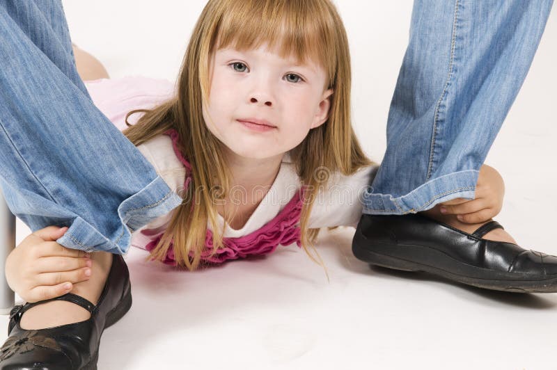 Between mom s legs stock image. Image of looking, portrait - 6950169