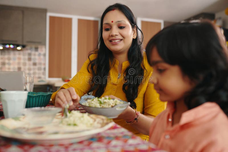 Mom Serving Meal for Her Child Stock Photo - Image of meal, food: 324004986