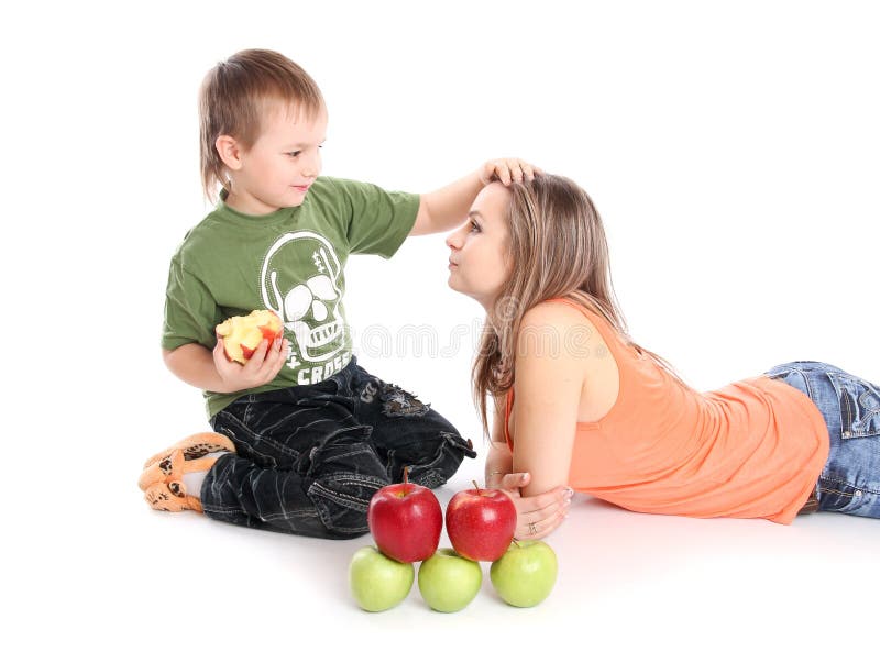 Mom with son and apples stock image. Image of care, female - 18537005