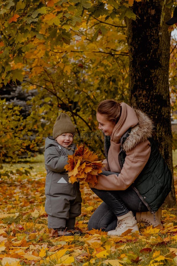 Mom and Son in Autumn Park Smiling Stock Image - Image of person ...