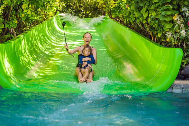 Mom and Son Have Fun at the Water Park Stock Image - Image of happy ...