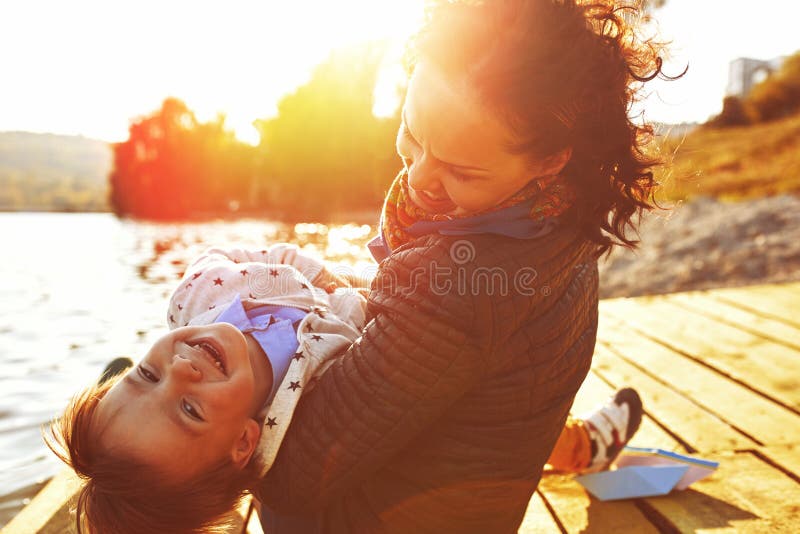 Mom and Son Having Fun by the Lake Stock Photo - Image of family, water ...