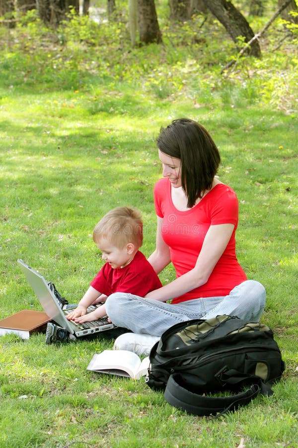 Mom and son on laptop stock photo. Image of share, casual - 5308462