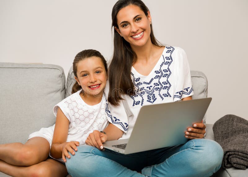 Mother Teaching Her Little Daughter Stock Photo - Image of couch, study ...