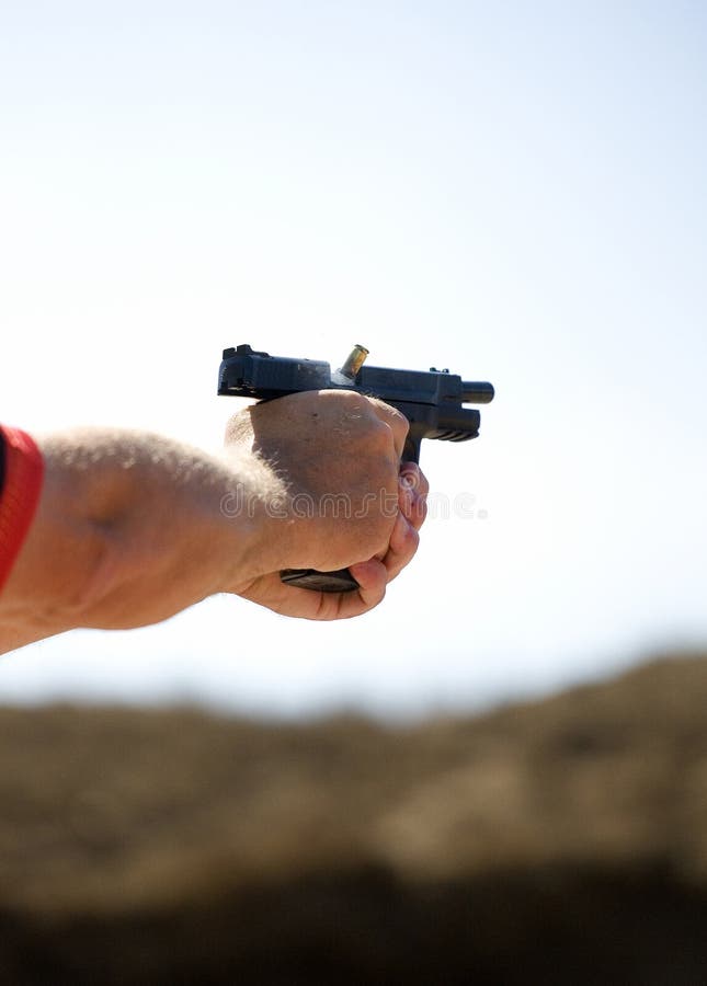 Pistol at the Moment of Being Shot Stock Image - Image of shooting ...