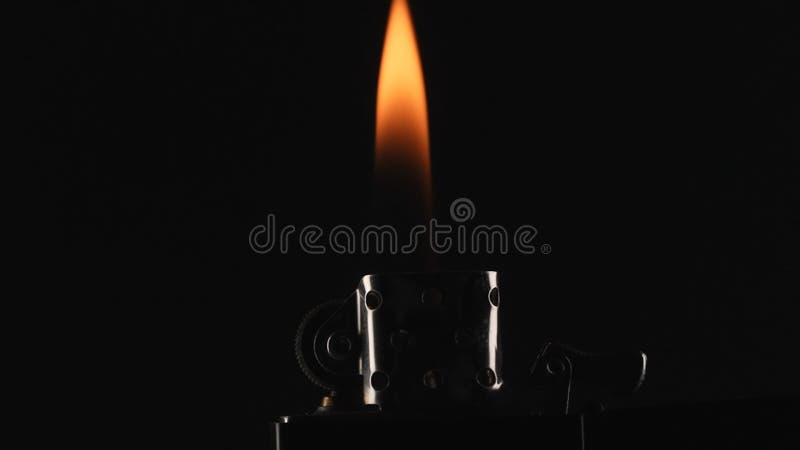 The Moment of Ignition and Burning of a Gasoline Lighter is Captured on ...