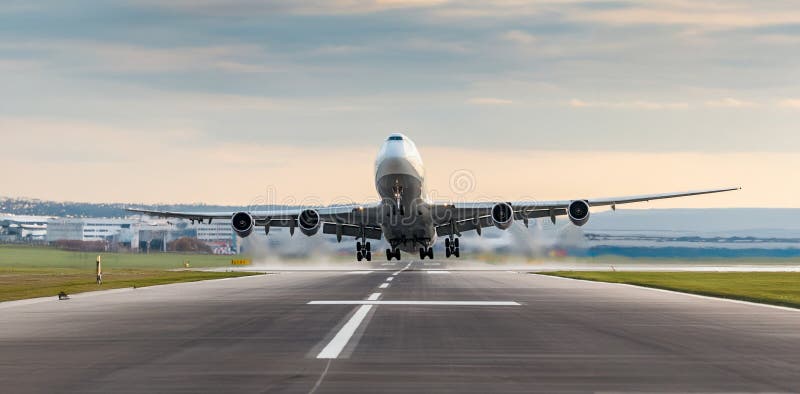 The Moment a Large Passenger Plane Lands on the Runway Stock Photo ...