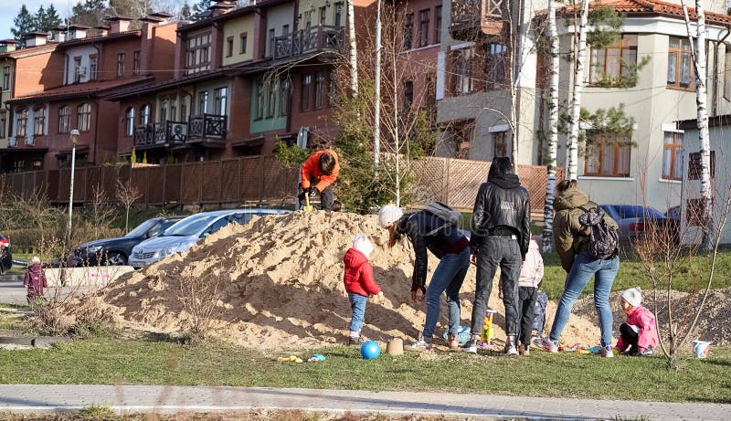 Moms with Children Play with a Mountain of Sand Editorial Photo - Image ...