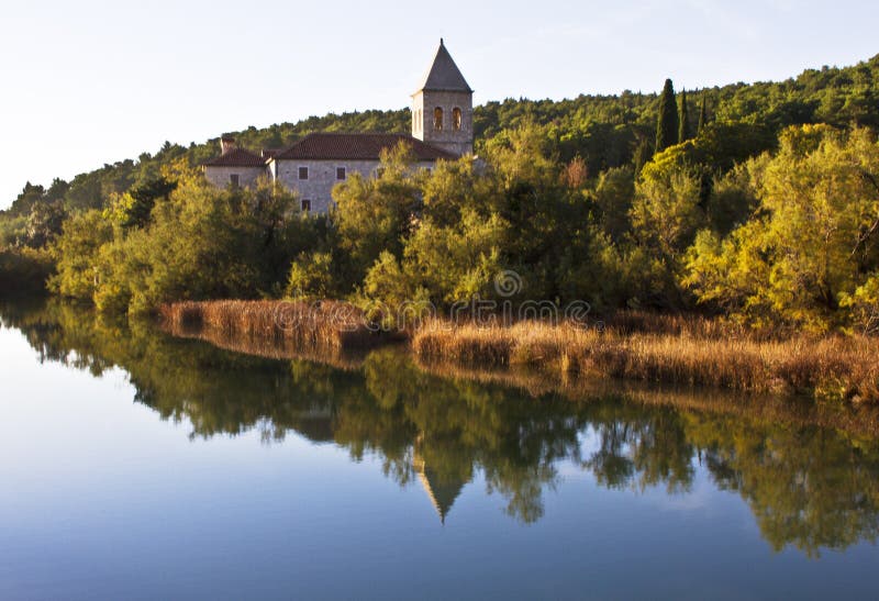 Monastery on the river stock image. Image of fauna, italy - 138550611