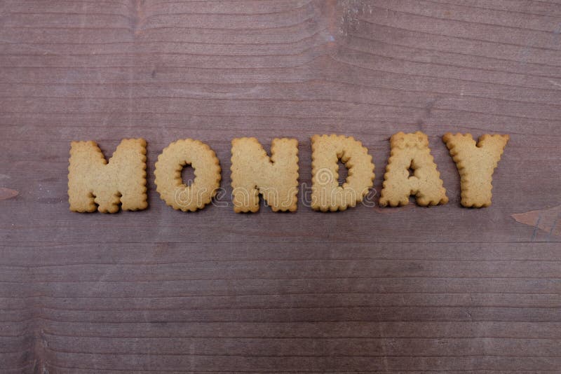 Monday Text Composed with Cookie Letters Over a Wooden Board Stock ...
