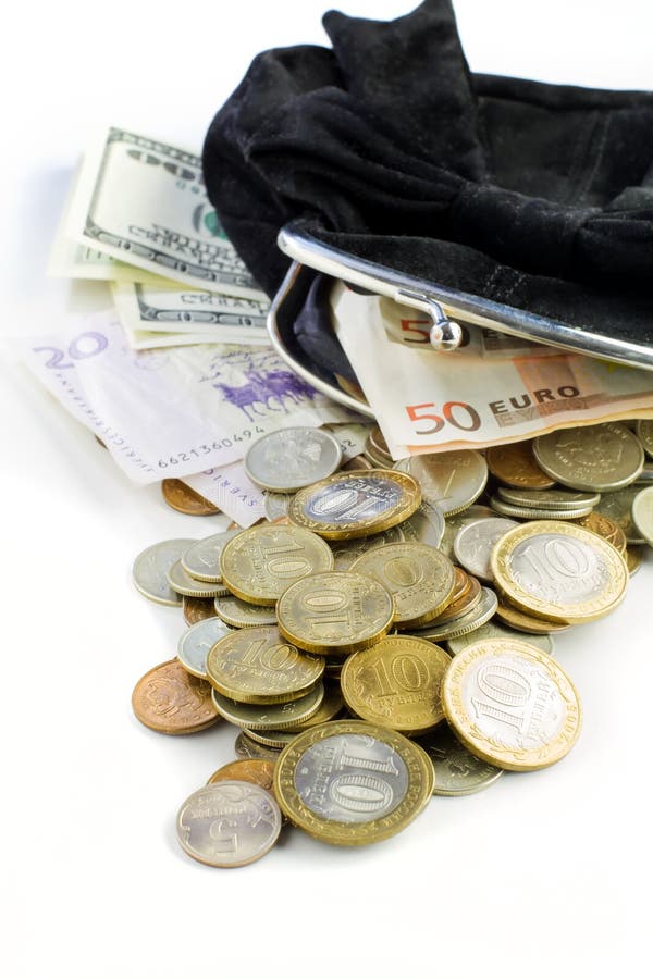 Un Monedero Abierto Por Completo Con Las Monedas Imagen de archivo ...