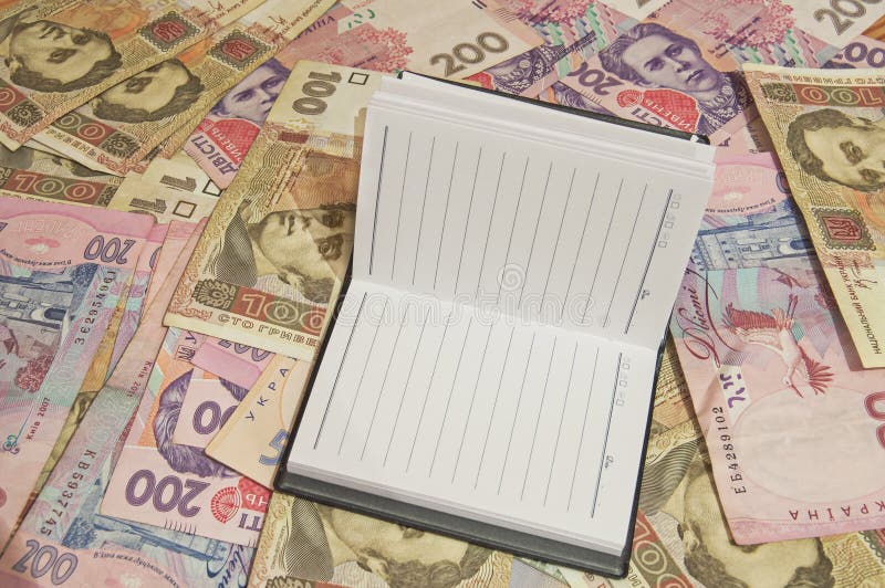Money in notebook stock image. Image of finances, notepad - 30085447