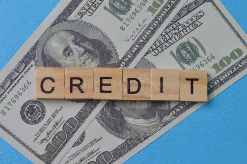 Money Banknotes and Square Letters with Text CREDIT Stock Photo - Image ...