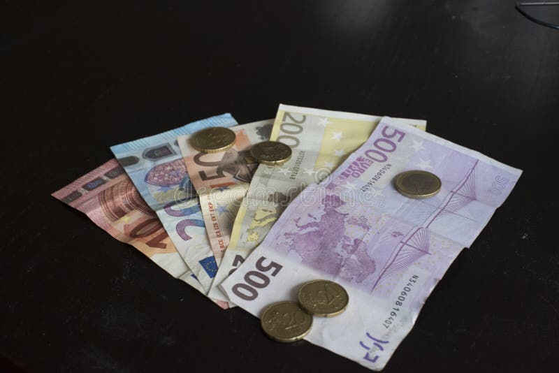 Money Bills and Euro Coins on a Table Stock Photo - Image of table ...