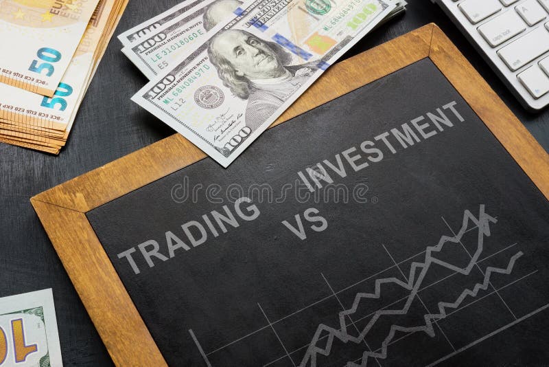 Money and Blackboard with Words Trading Vs Investing. Stock Photo ...