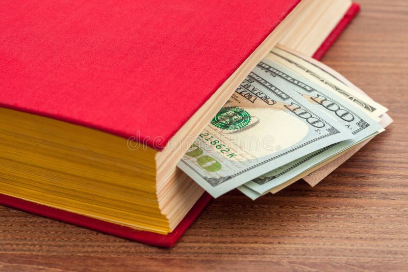 Money in the book. stock photo. Image of board, book - 77450884