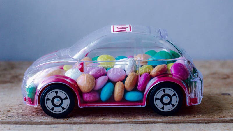 Candy in Toy Car - Money Box Stock Photo - Image of candies, business ...