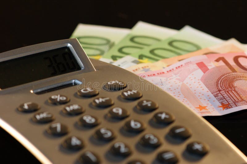 Money And Calculator Picture. Image: 6033995