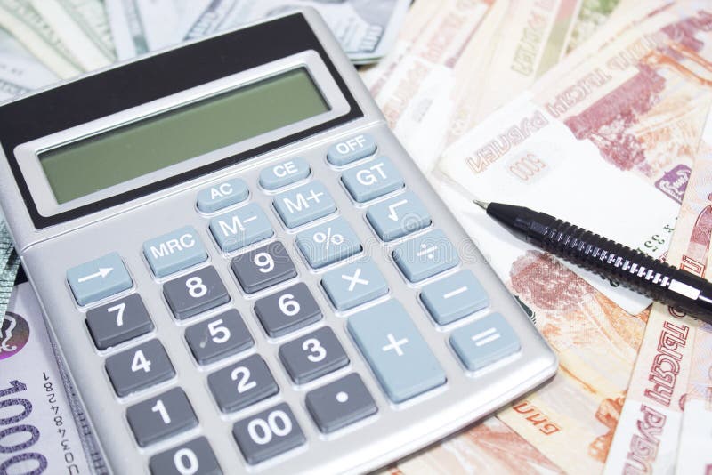 Money with calculator stock photo. Image of earnings - 214841388