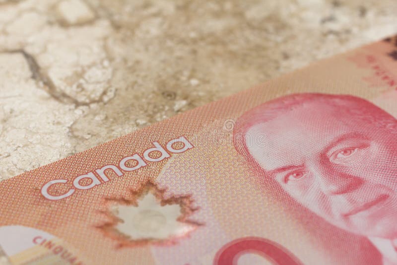 Money from Canada: Canadian Dollars. Closeup on Marble Table Stock ...