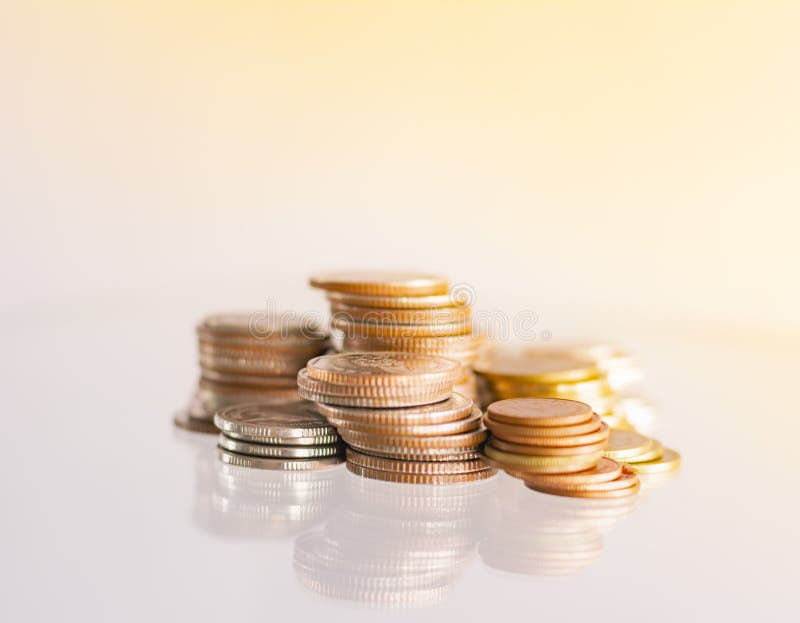 Money Coins stacked stock image. Image of improvement - 164523329